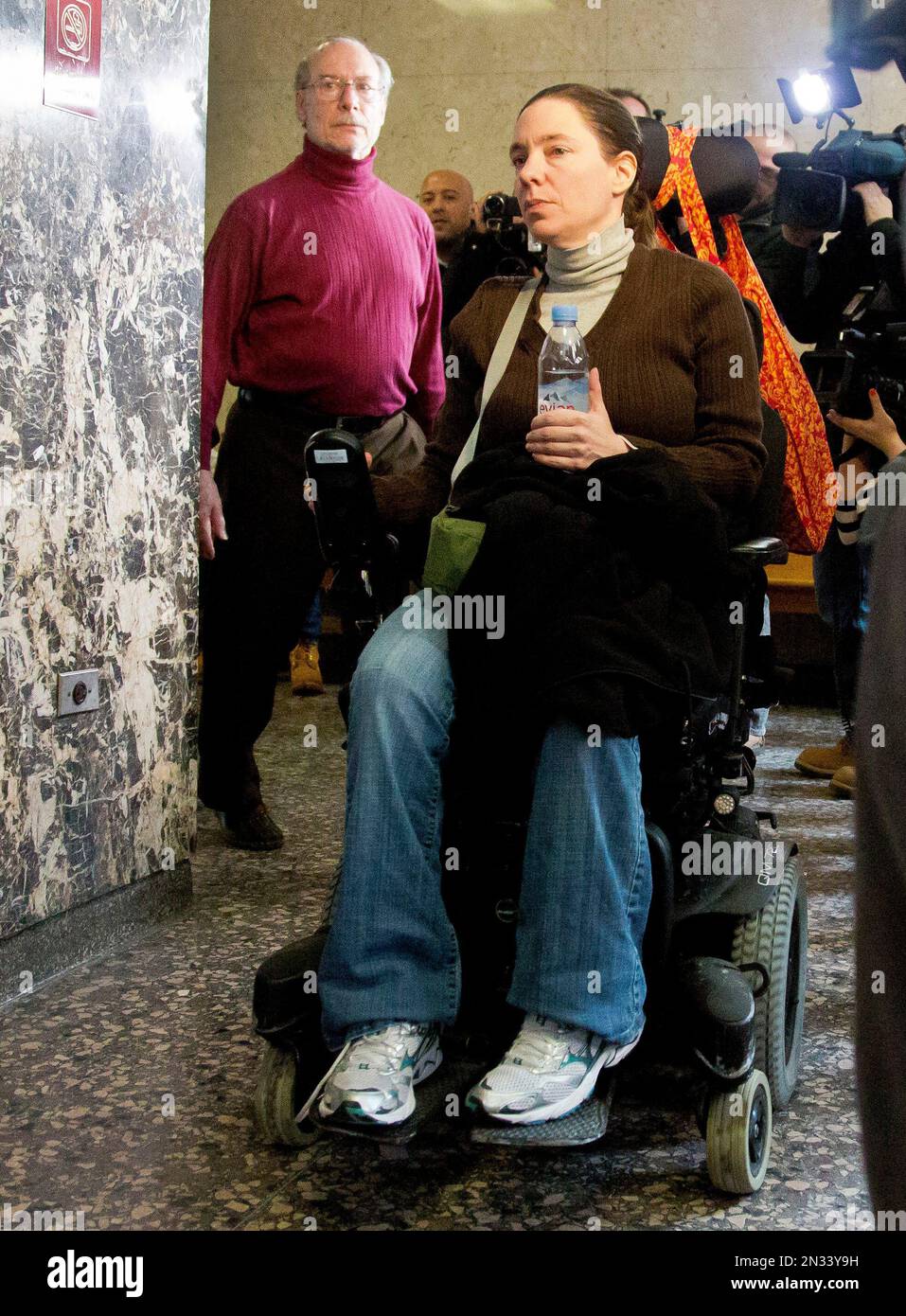 Stanley Patz, left, the father of Etan Patz, follows his wheelchair ...