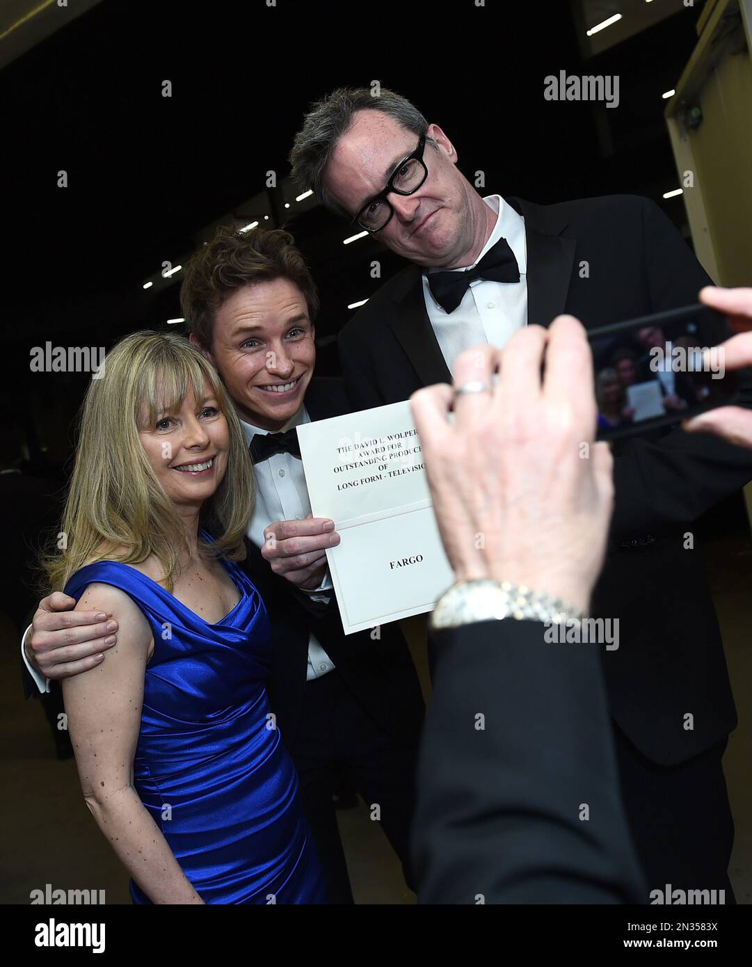 EXCLUSIVE - Eddie Redmayne, center, poses with Kim Todd, left, and John ...