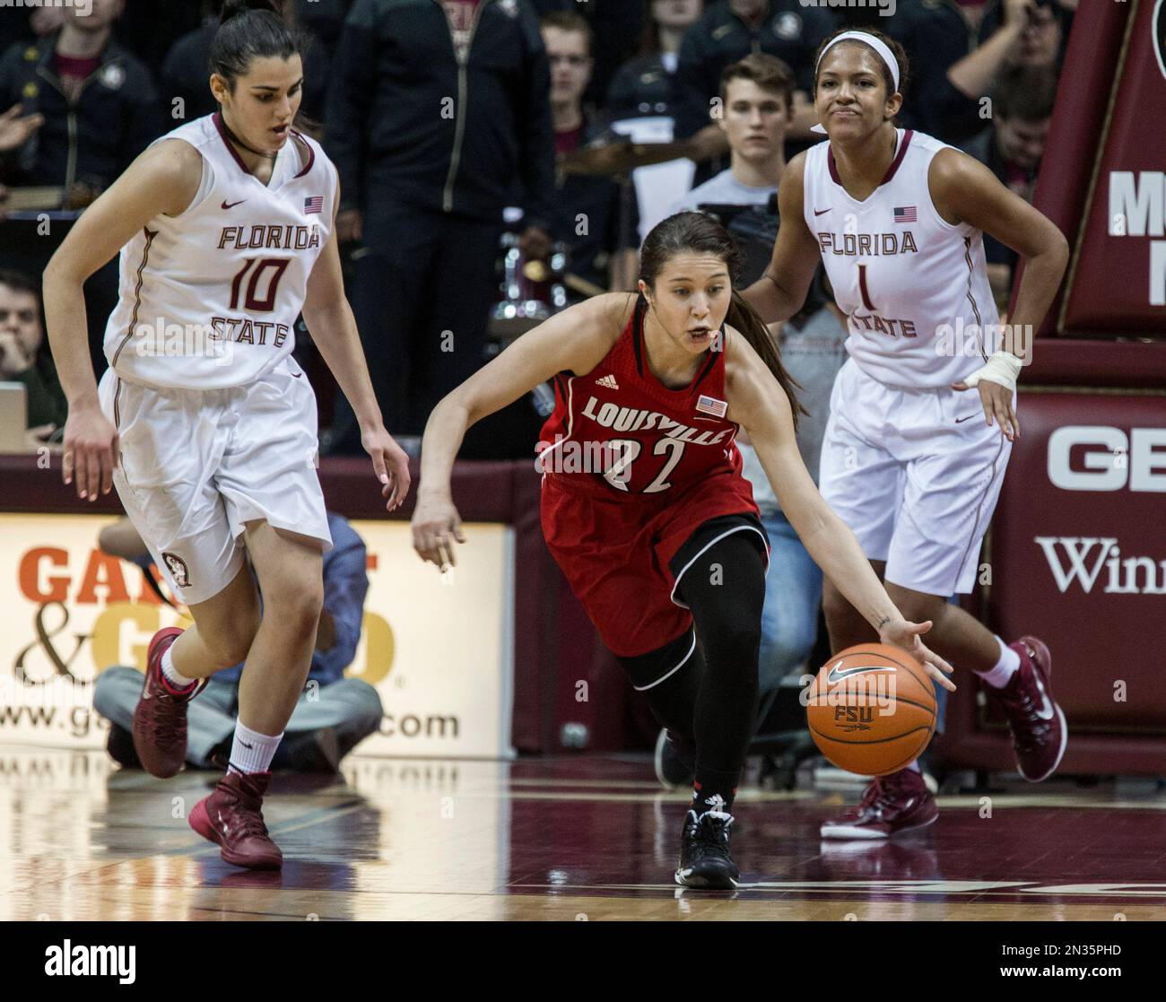 Louisville guard Jude Schimmel heads up the court with a rebound during ...