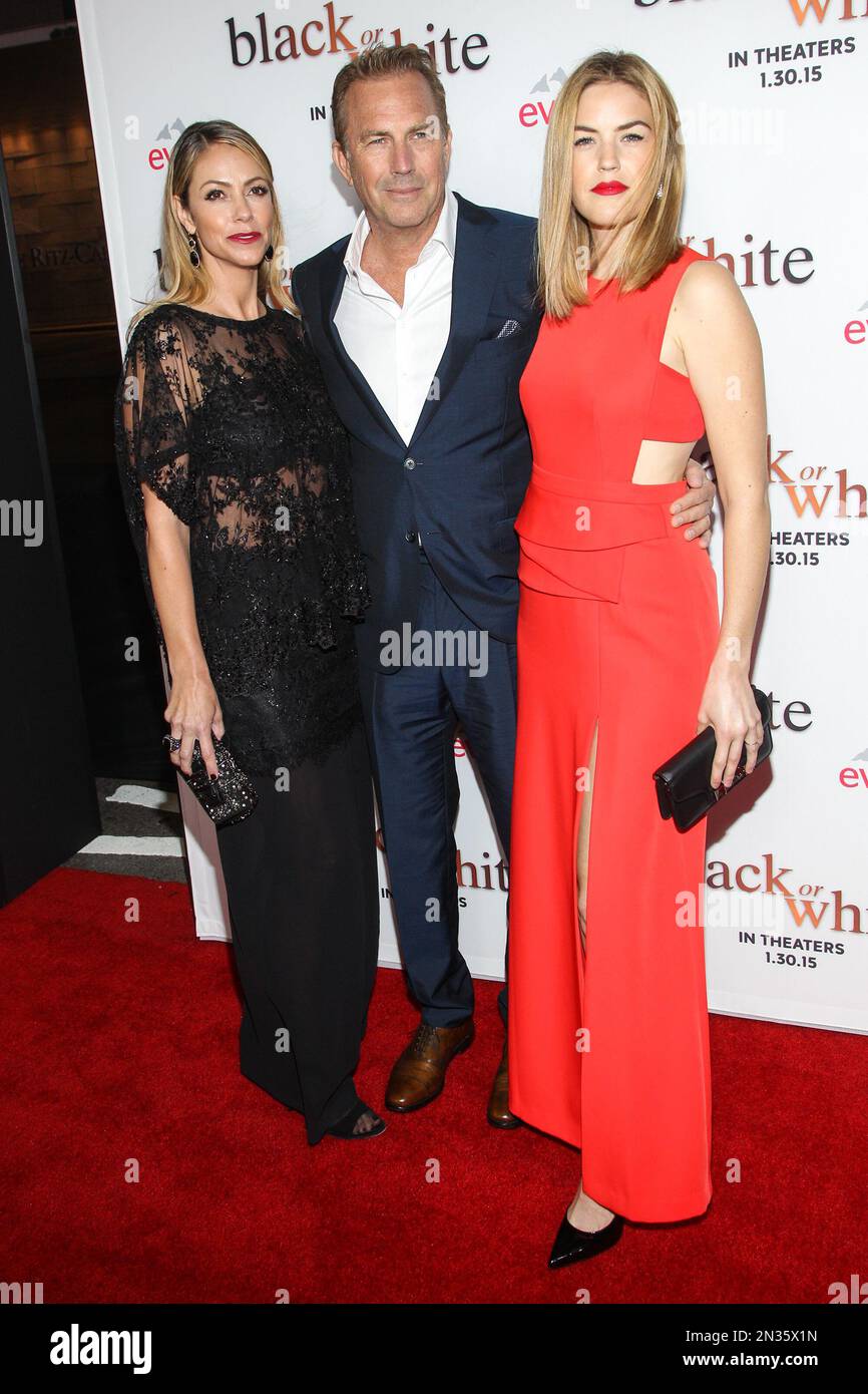 From left, Christine Baumgartner, Kevin Costner and Lily Costner attend ...