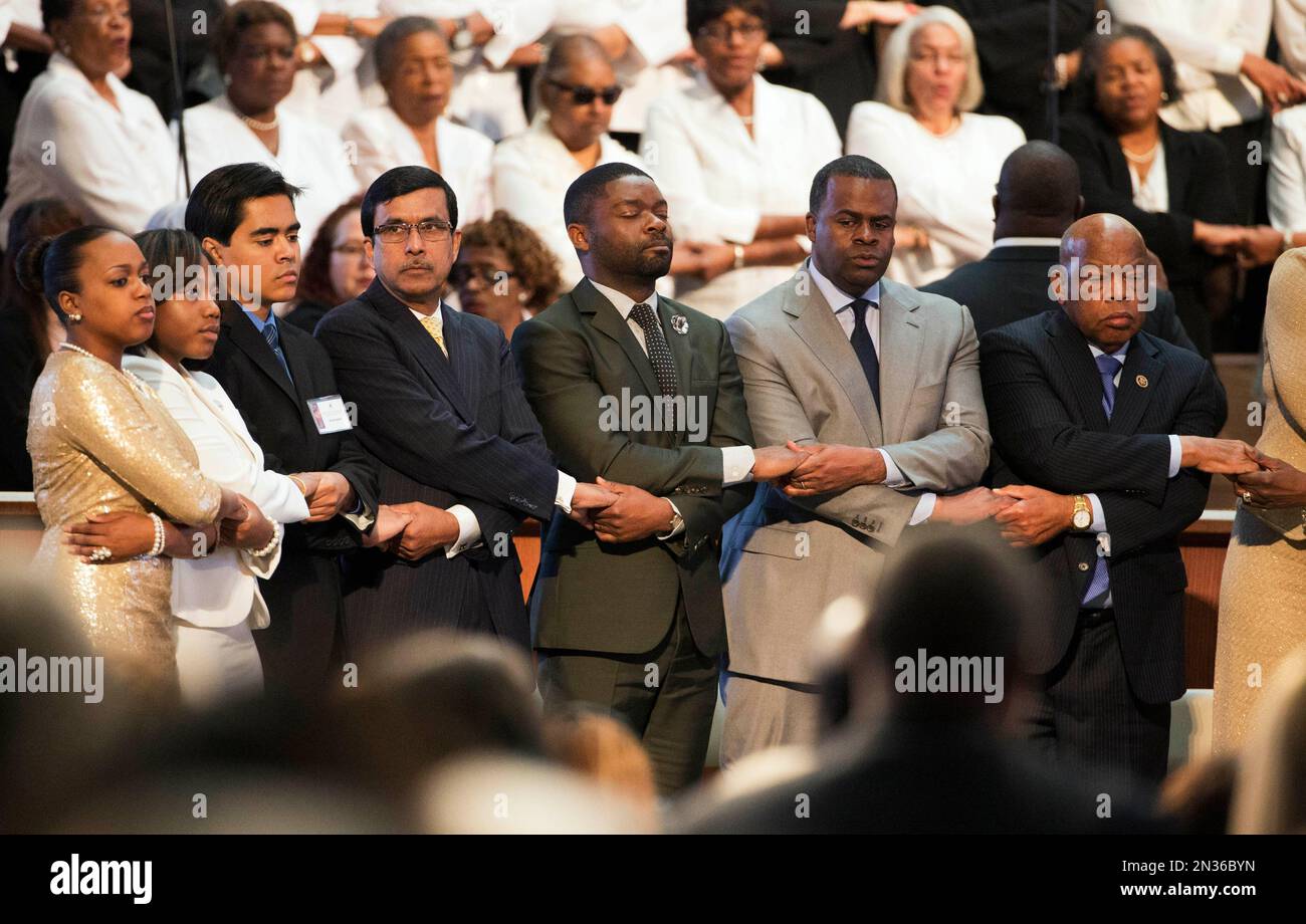 Dr. Mohammad Bhuiyan, fourth from left, joins hands with actor David ...