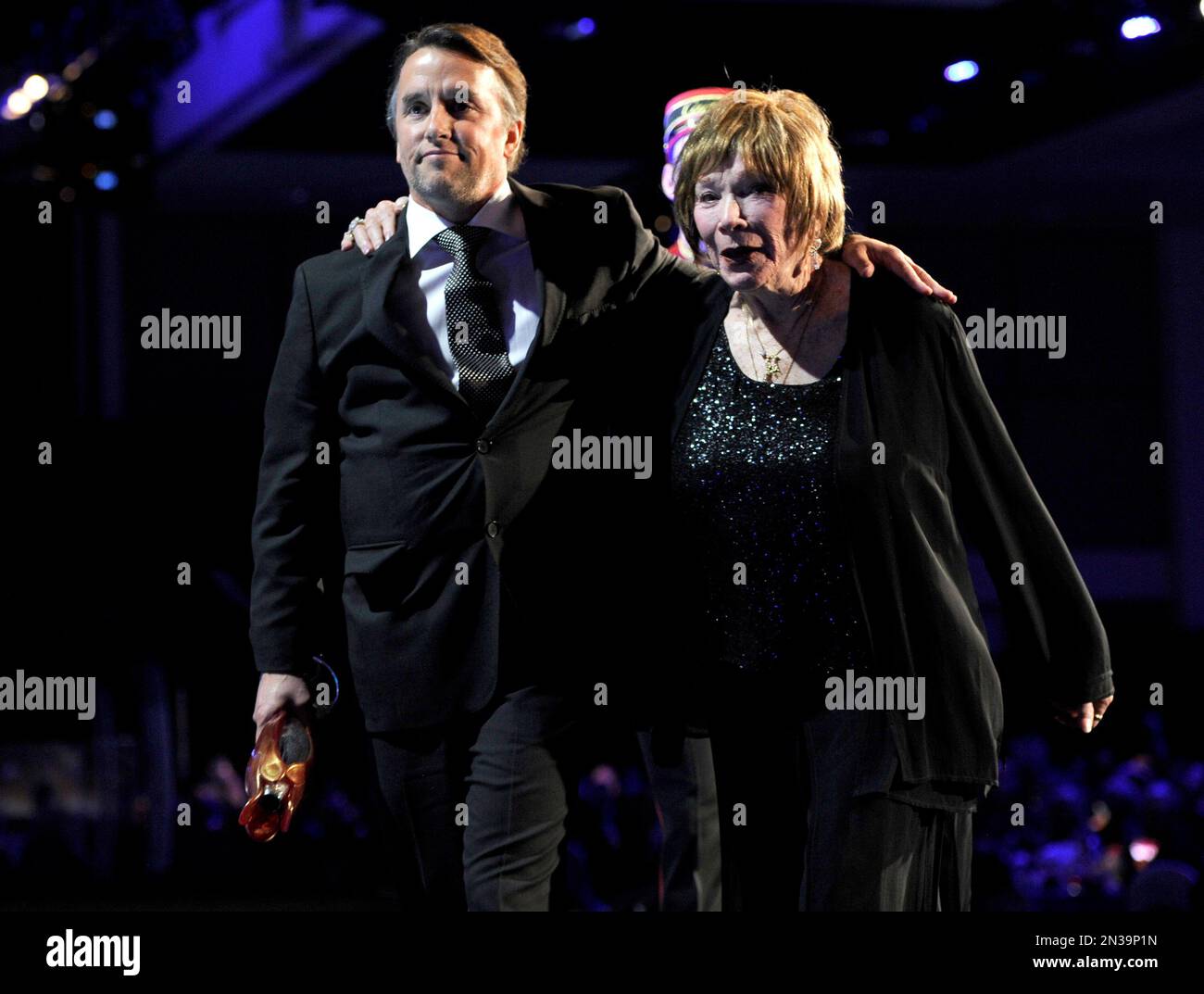 Richard Linklater, winner of the Sonny Bono visionary award, left, and ...