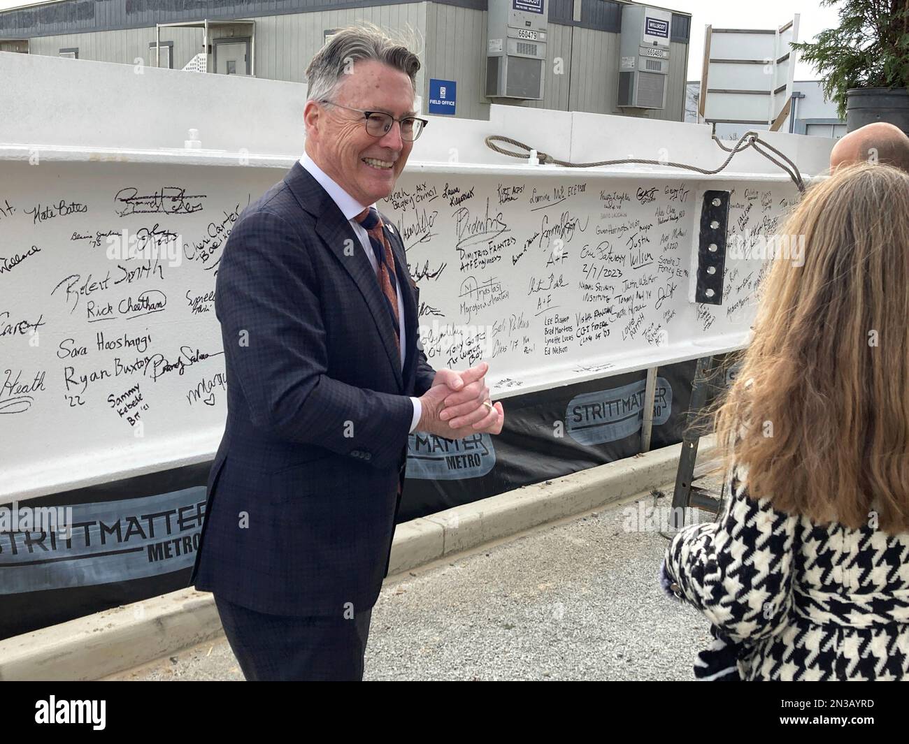 Virginia Tech President Tim Sands after signing a steel beam that will ...