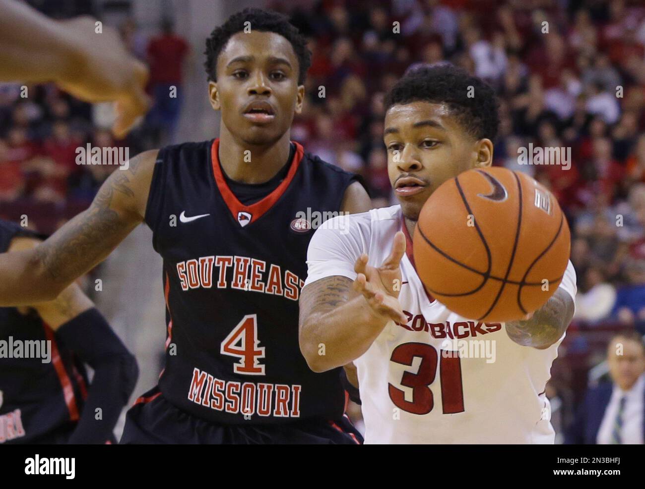 Anton Beard passes in front of Southeast Missouri State's Antonius ...