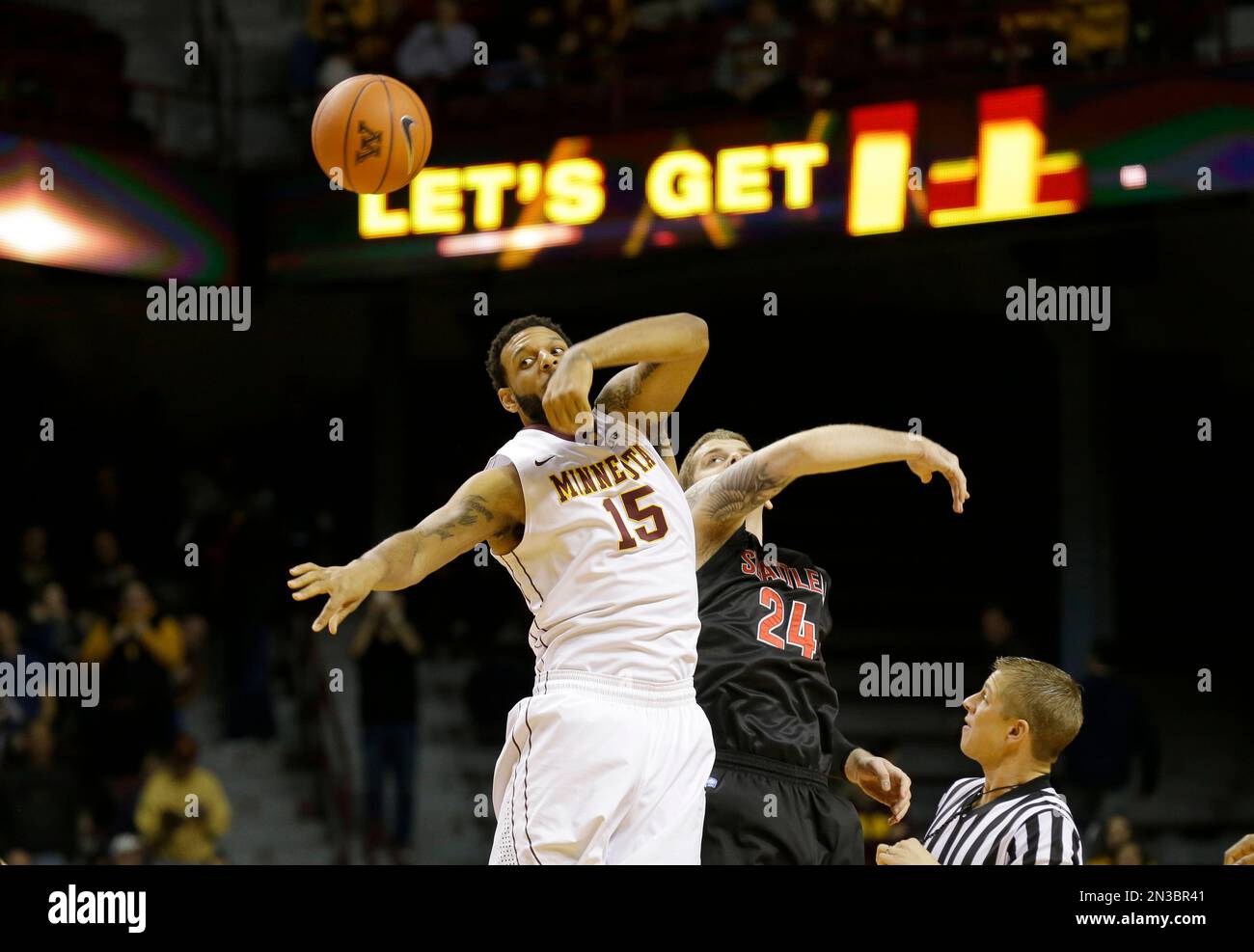 Minnesota forward Maurice Walker (15) and Seattle center Jack Crook (24 ...