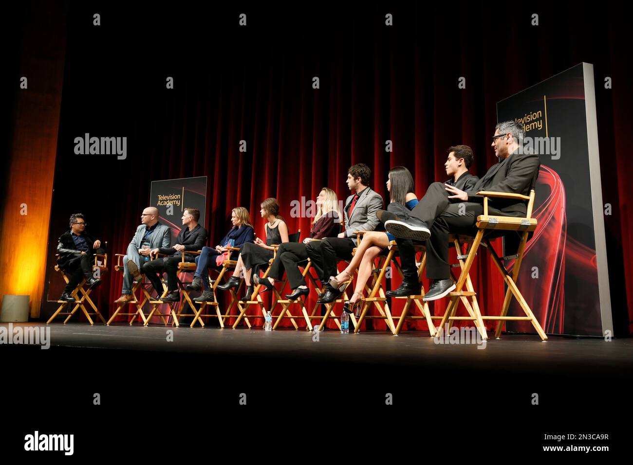 From left to right, moderator Alec Mapa, executive Producer, showrunner ...