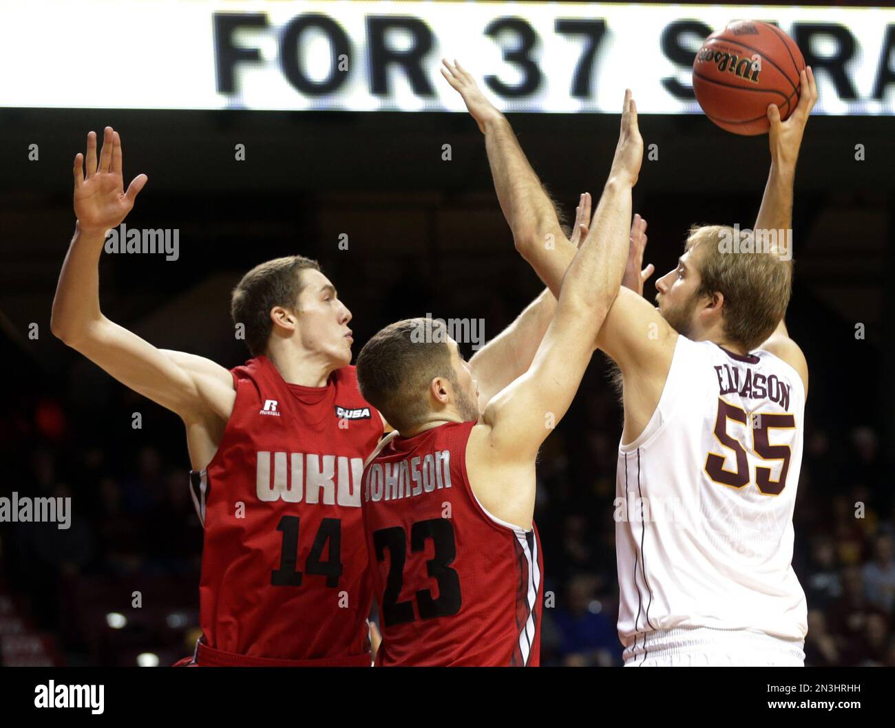 Minnesota’s Elliott Eliason, right, shoots over Western Kentucky’s Ben ...