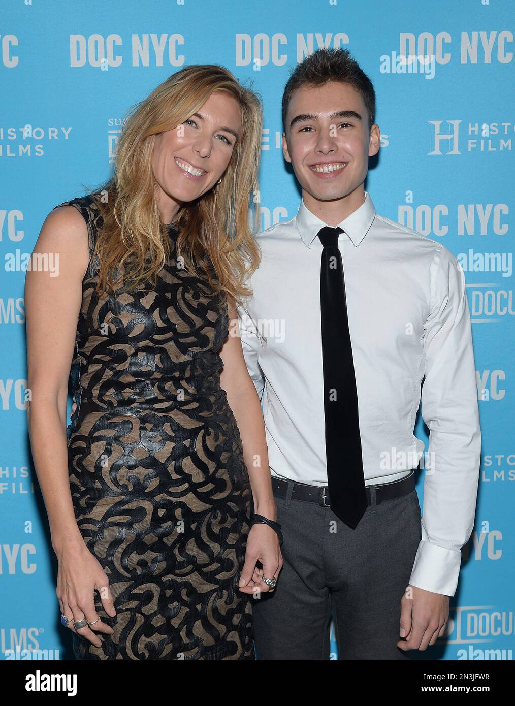 Director Amy Berg poses with Evan Henzi from the film, at the world ...