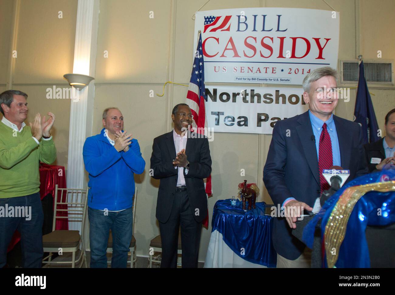 U.S. Senate candidate Rep. Bill Cassidy, R-La., right, speaks during a ...