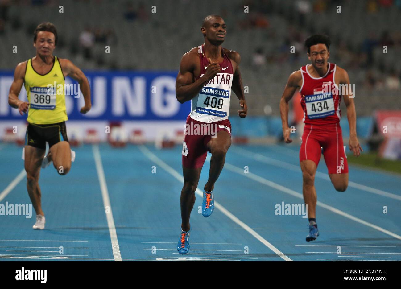 From left to right: Mongolia's Shijirbaatar Ganbold, Qatar's Femi Seun ...