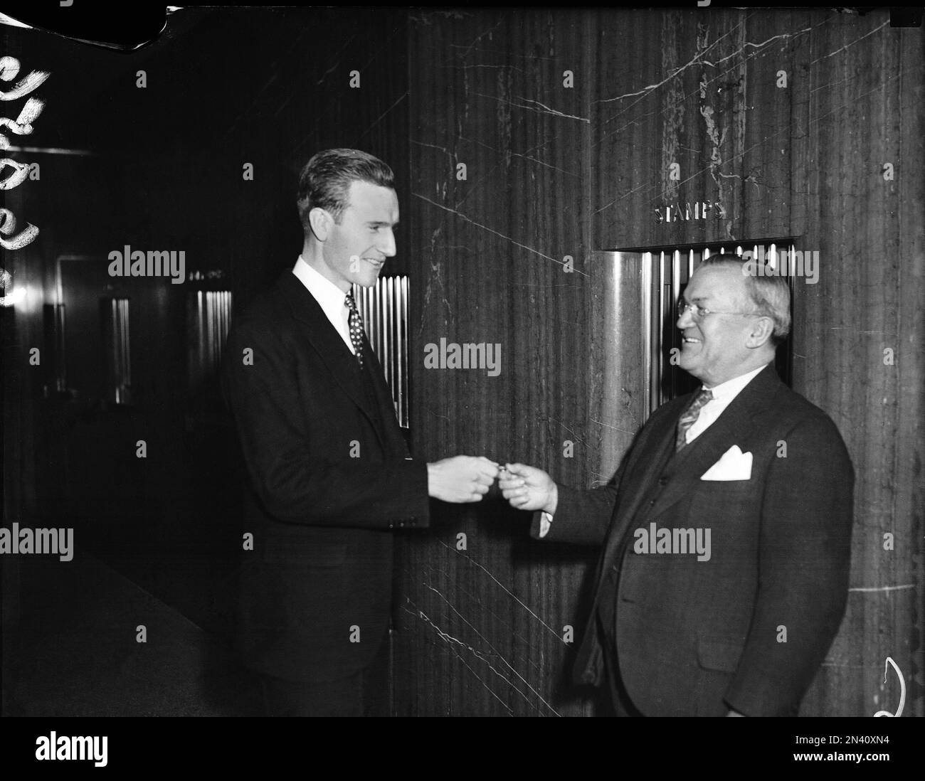 John D. Rockefeller III (left), presenting the keys to Postmaster John ...