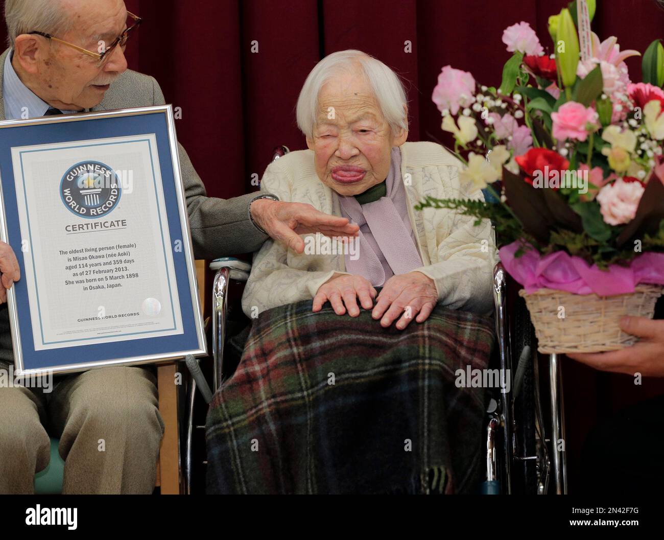 FILE - In this Feb. 27, 2013 file photo, Japan's then 114-year-old Misao Okawa, right, and her ...