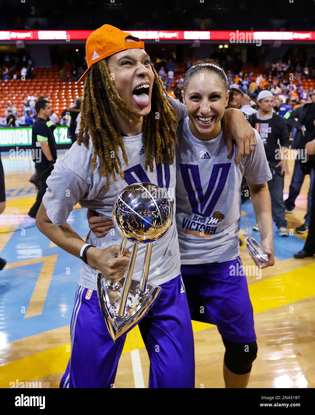 Phoenix Mercury's Brittney Griner, left, holds the WNBA championship ...