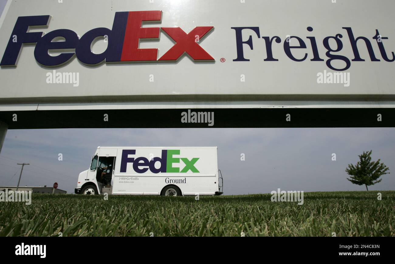 File - This June 21, 2005 file photo shows a Federal Express delivery ...