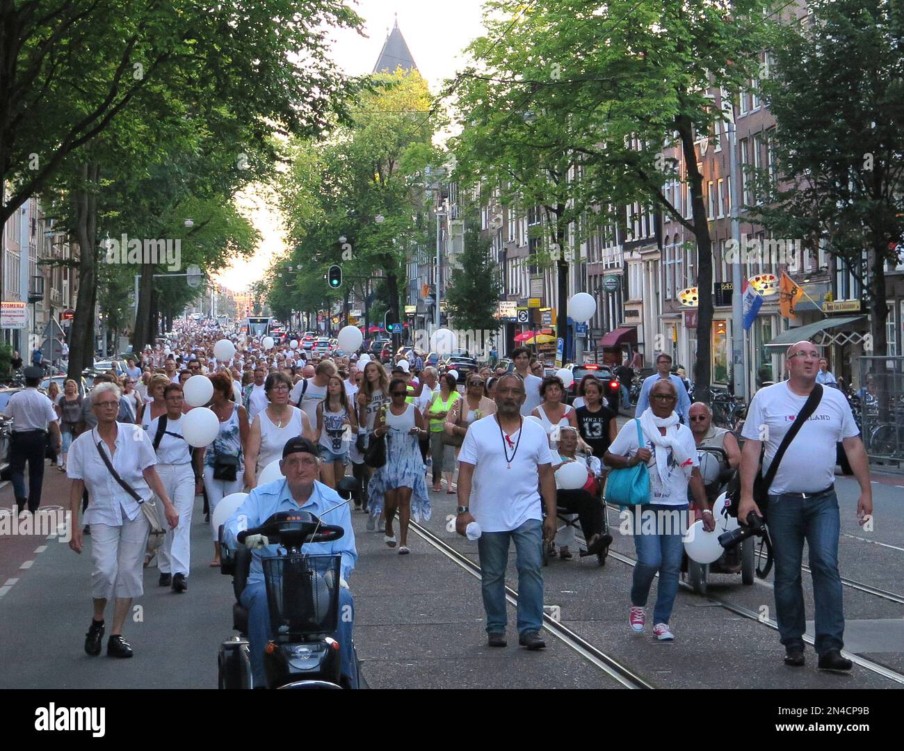 CAPTION CORRECTS PHOTOGRAPHER'S NAME - People attend a silent march of ...