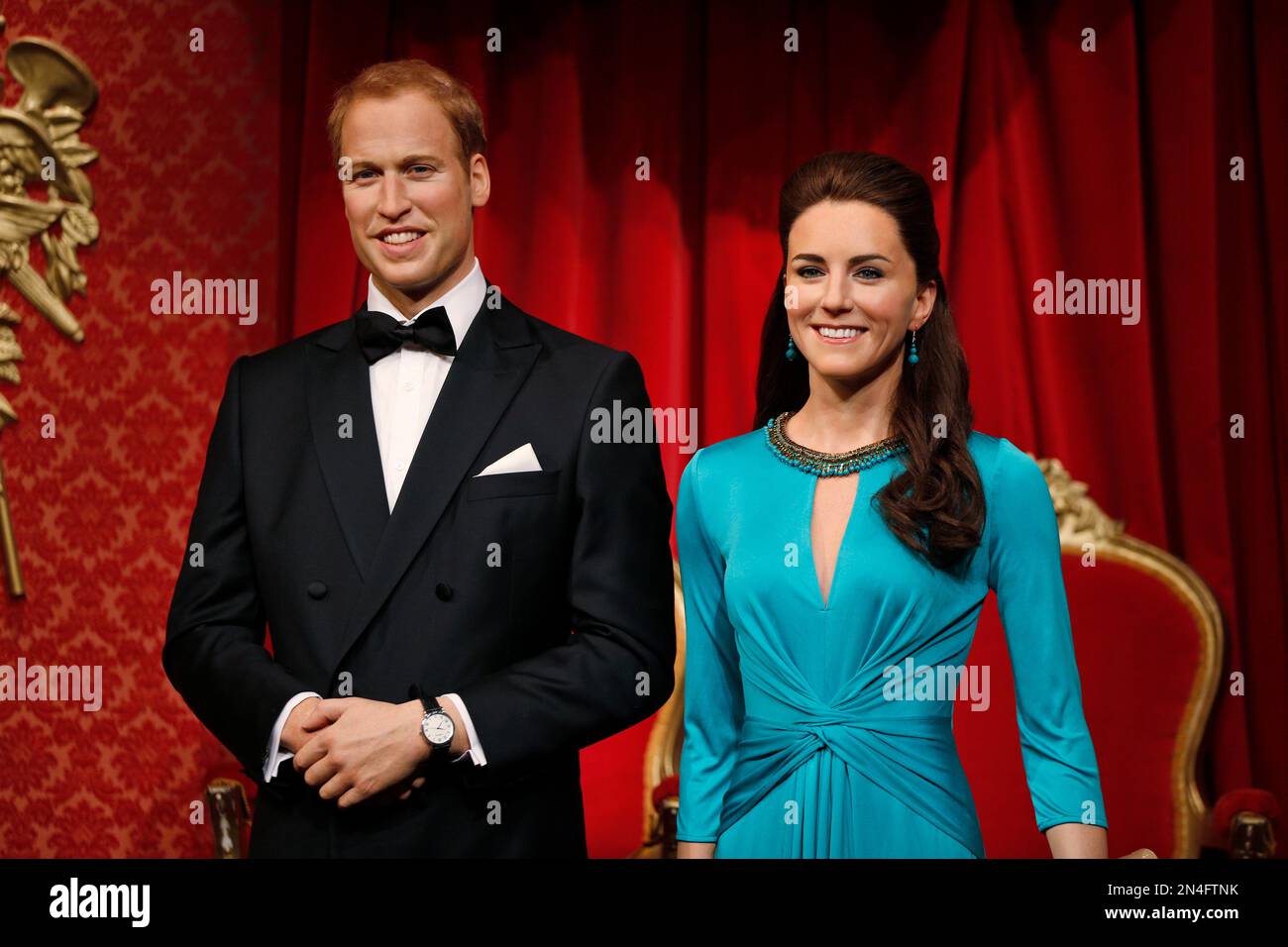 The wax figure of Britain's Prince William, left, and his wife Kate ...