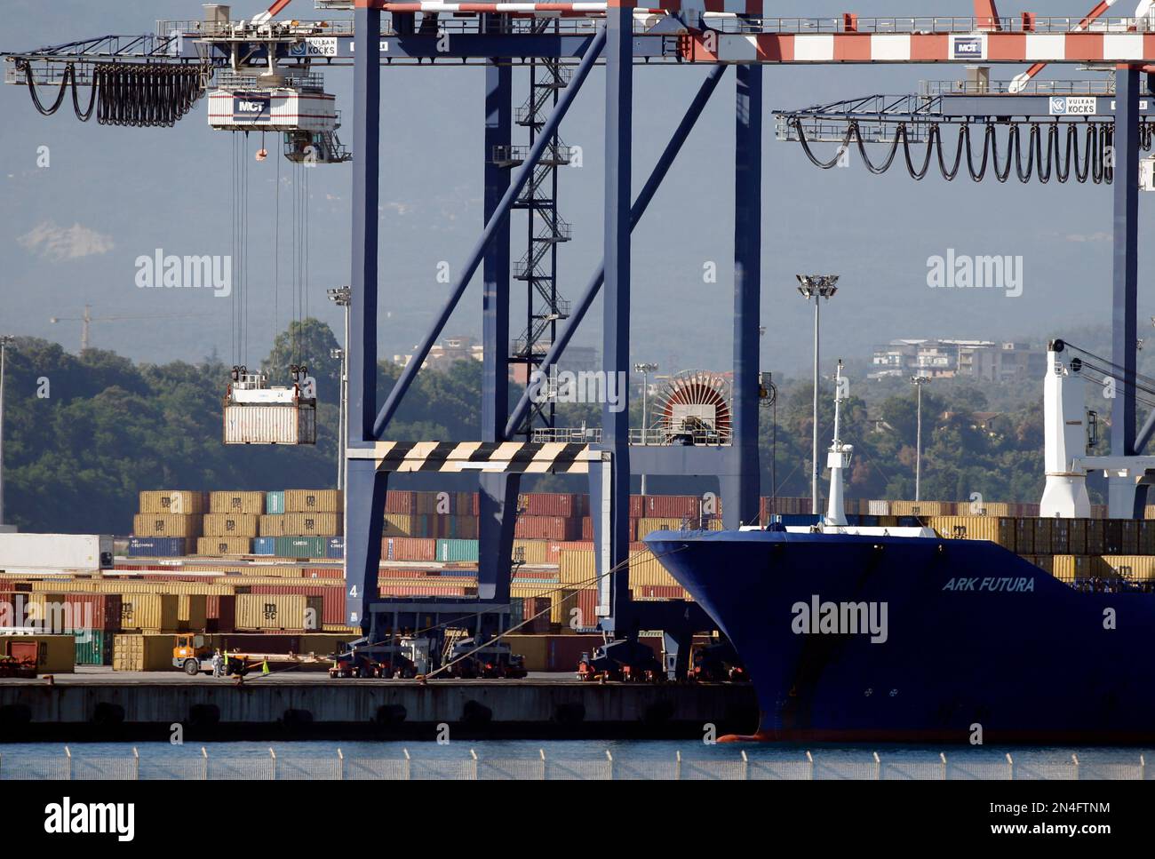A container from the Danish vessel Ark Futura is lowered onto a truck ...