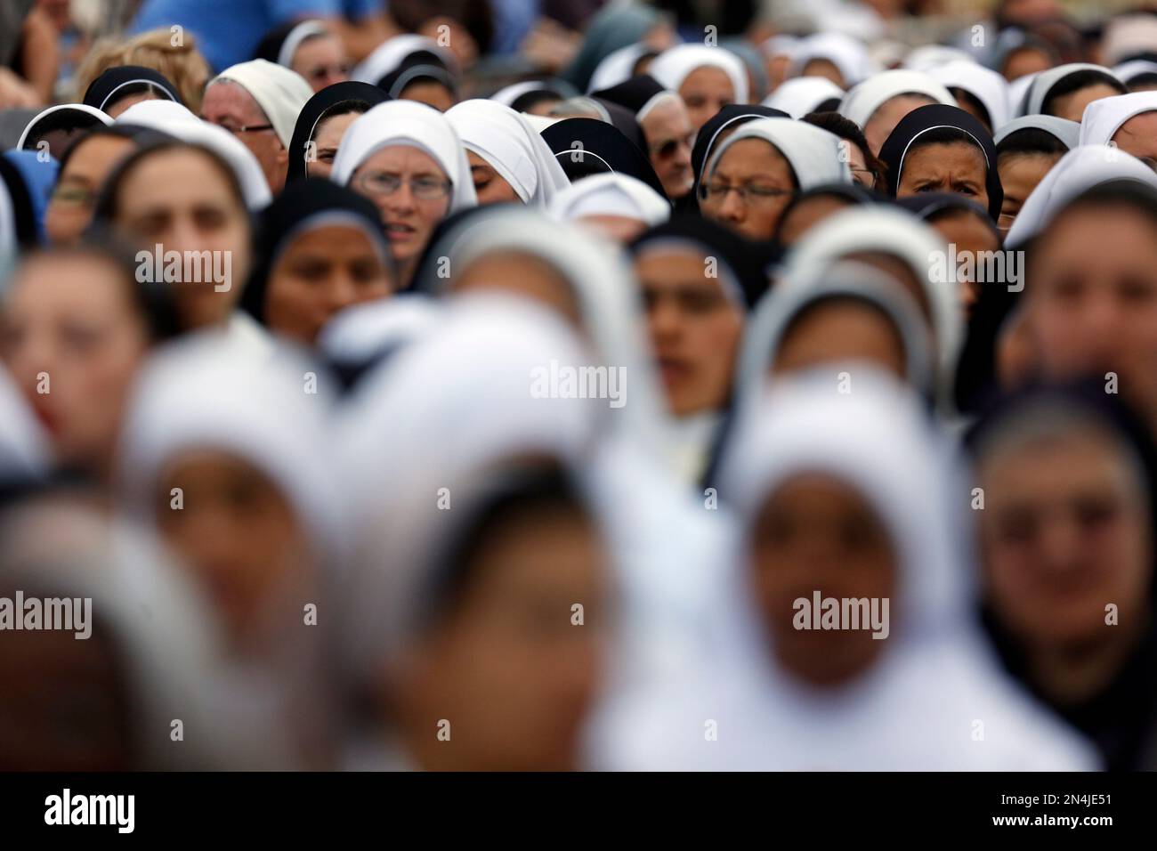 Nuns wait for the start of a mass Pope Francis celebrates outside St ...