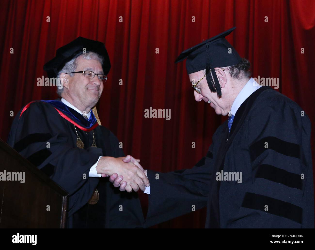 Dr. Nicholas Covino, MSPP president, left, congratulates Kenneth R ...