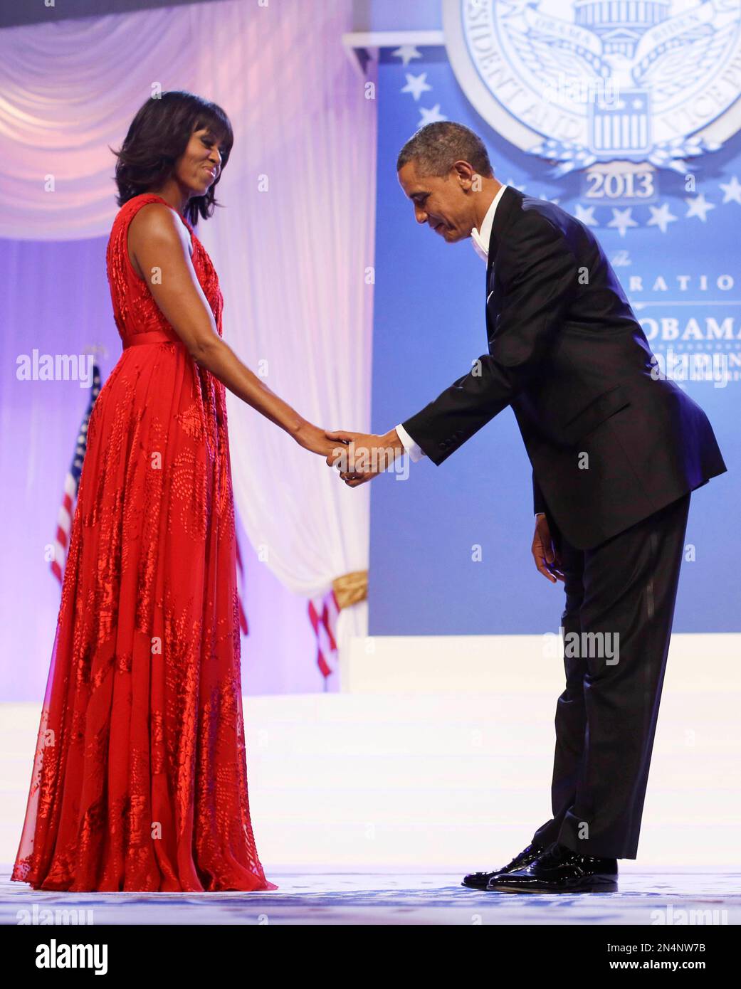 FILE - In this Jan. 21, 2013 file photo, President Barack Obama bows as he and first lady ...