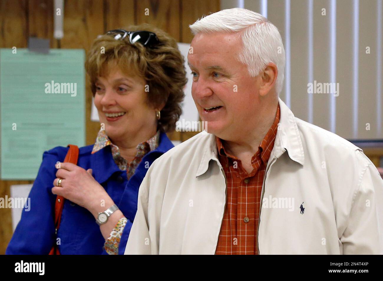 Pennsylvania Gov. Tom Corbett, right,arrives with his wife Susan at his ...