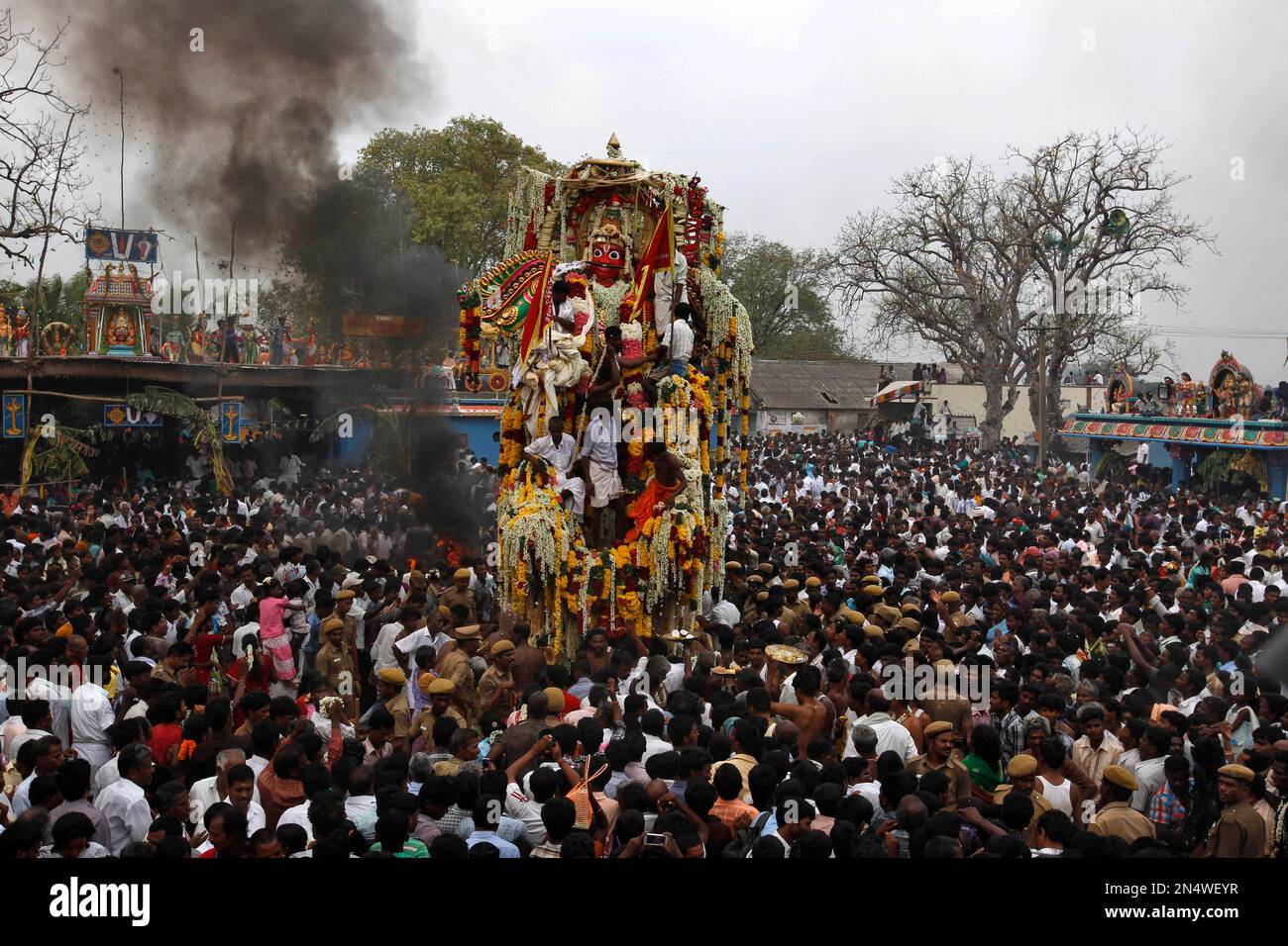 An idol of warrior god Aravan is taken around in a chariot during the ...