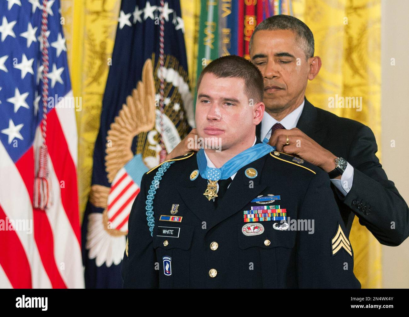 President Barack Obama awards the Medal of Honor to former Army Sgt. Kyle J. White during a ...