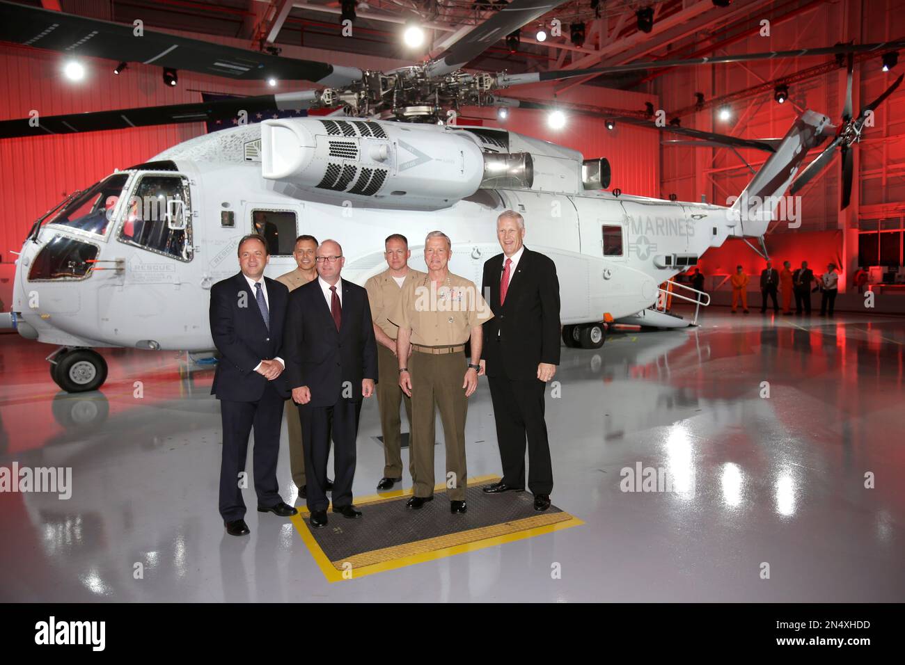 Dignitaries pose in front of the new Sikorsky CH-53K heavy lift ...