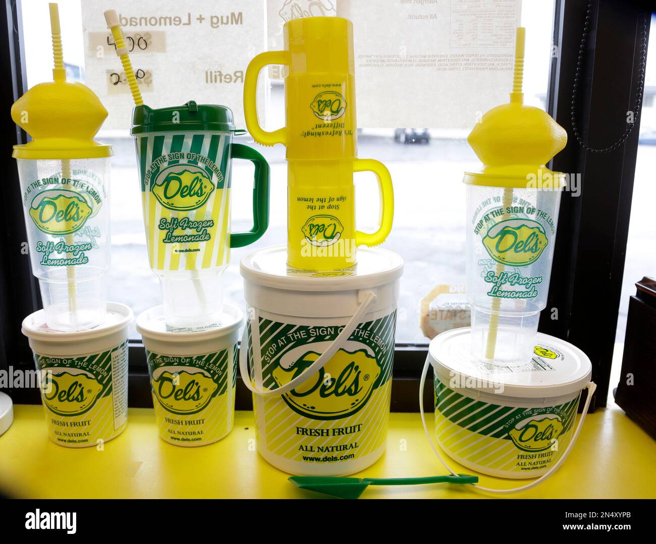 This April 30, 2014 photo shows drink containers in the window of a Del ...