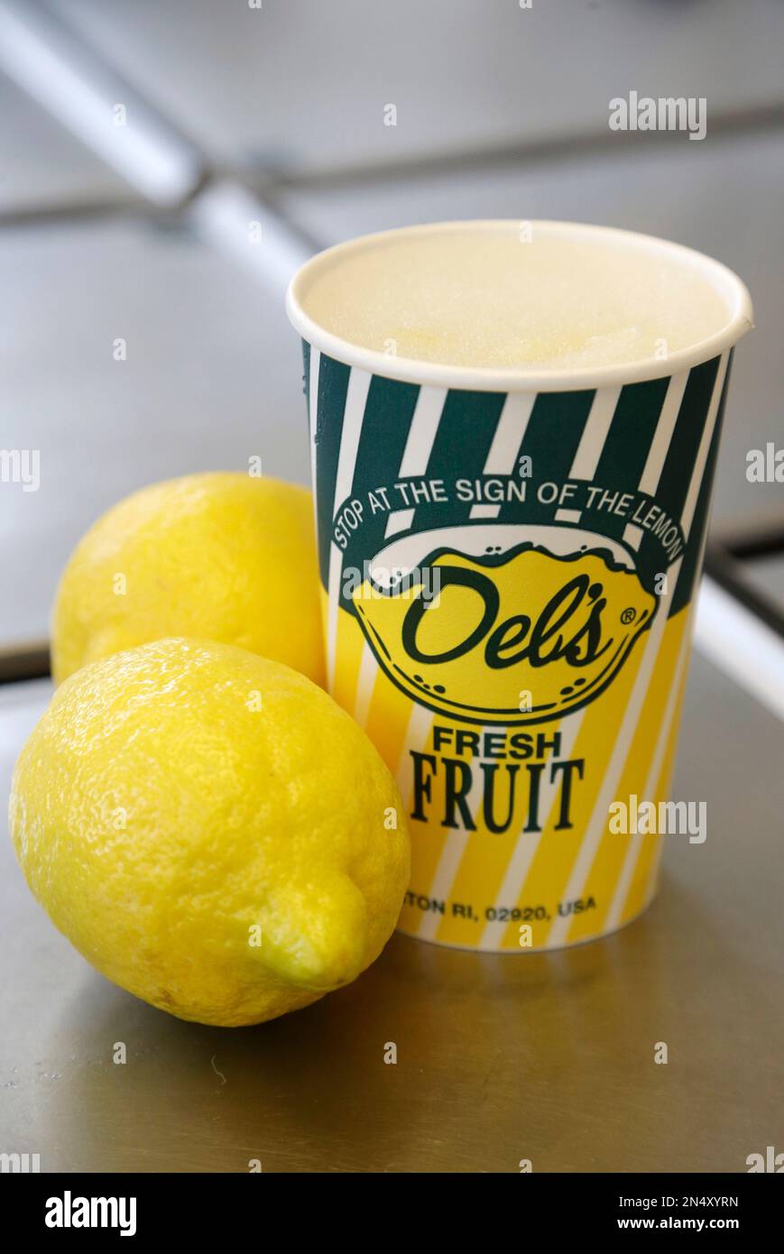 This April 30, 2014 photo shows fresh lemons near a frozen lemonade ...