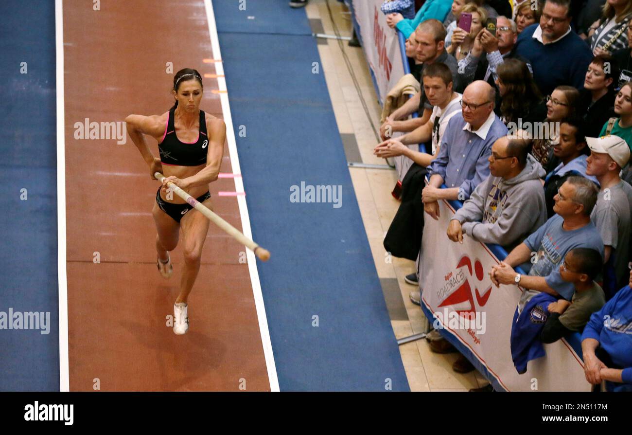 April Steiner Bennett heads down the runway during the pole vault at ...
