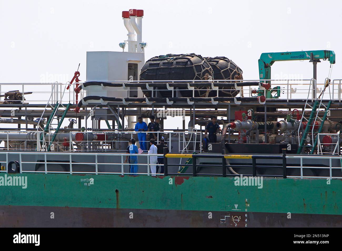 Malaysian marine police officers inspect the Naniwa Maru 1 at Klang ...