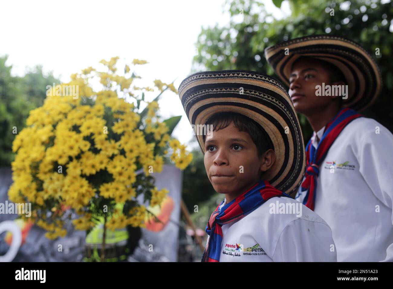 Boys from a music band attend a symbolic funeral ceremony for the late ...