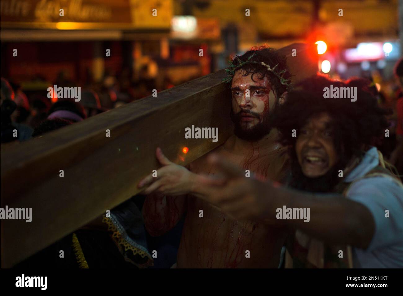A man plays the role of Jesus during the reenactment of the Passion of ...