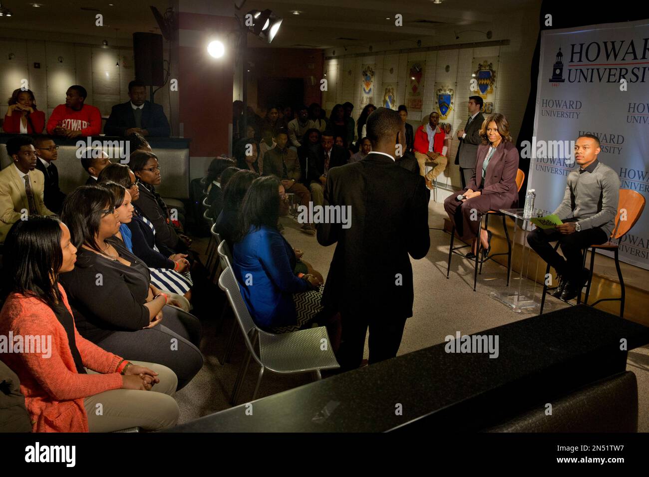 High school students from Chicago listen as first lady Michelle Obama ...