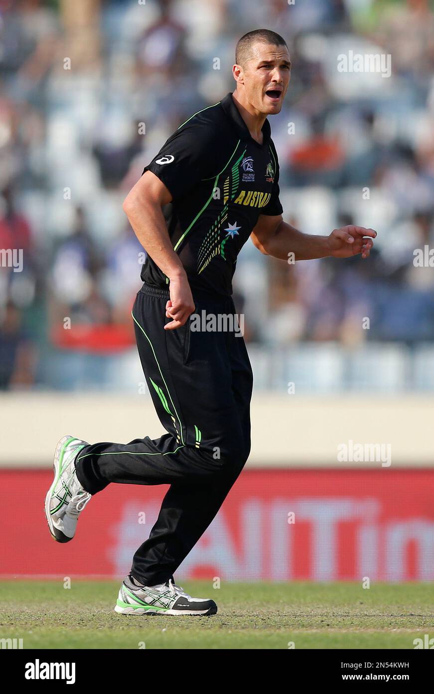 Australia's bowler Nathan Coulter-Nile gestures to his teammates after ...