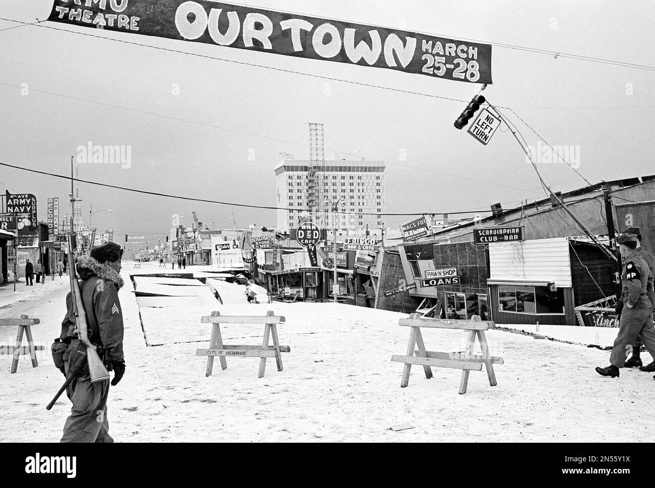 File - In this March 29, 1964 file photo, a soldier crosses Fourth ...