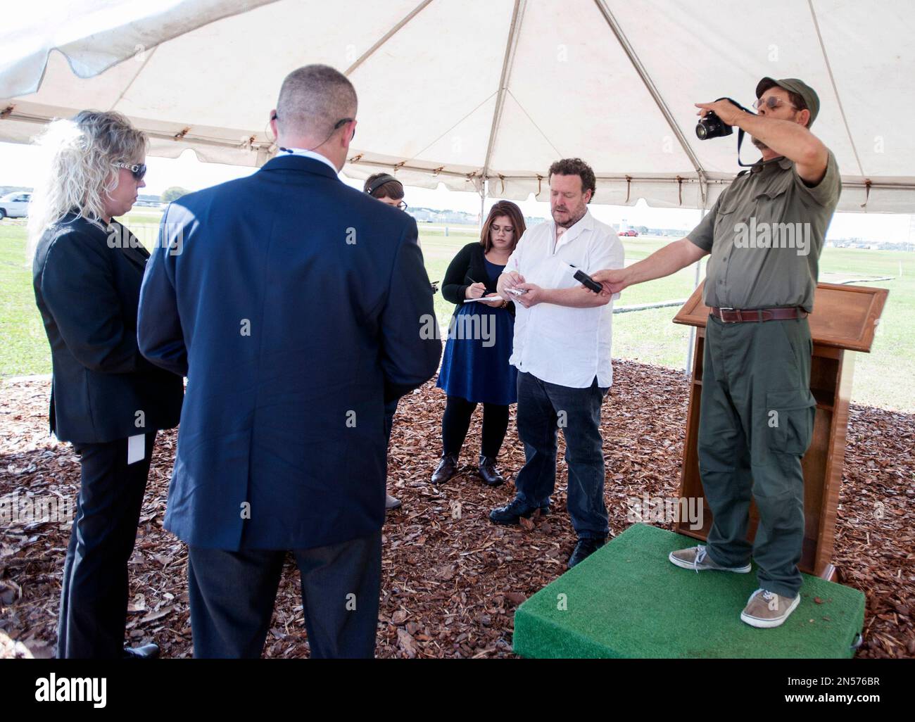 Jeffrey McClellan, Assistant Warden for the Florida State Prison, reads ...