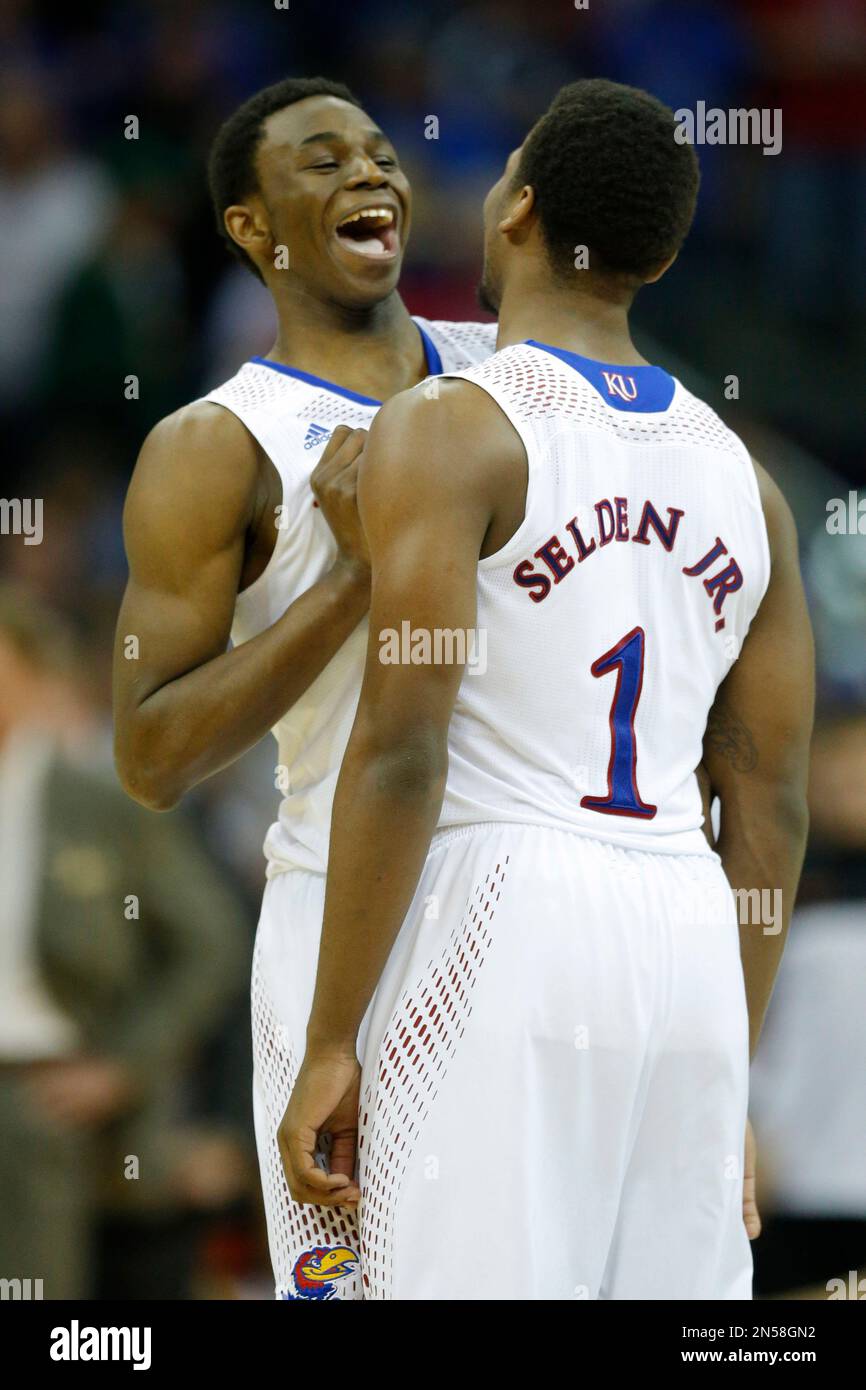 Kansas guard Andrew Wiggins, back, and Wayne Selden, Jr. (1) overtime ...