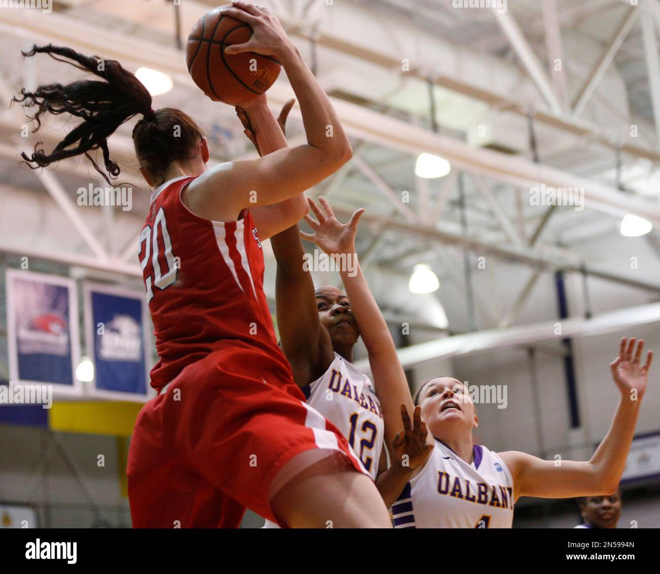 Stony Brook forward Brittany Snow (20) grabs the ball in front of ...