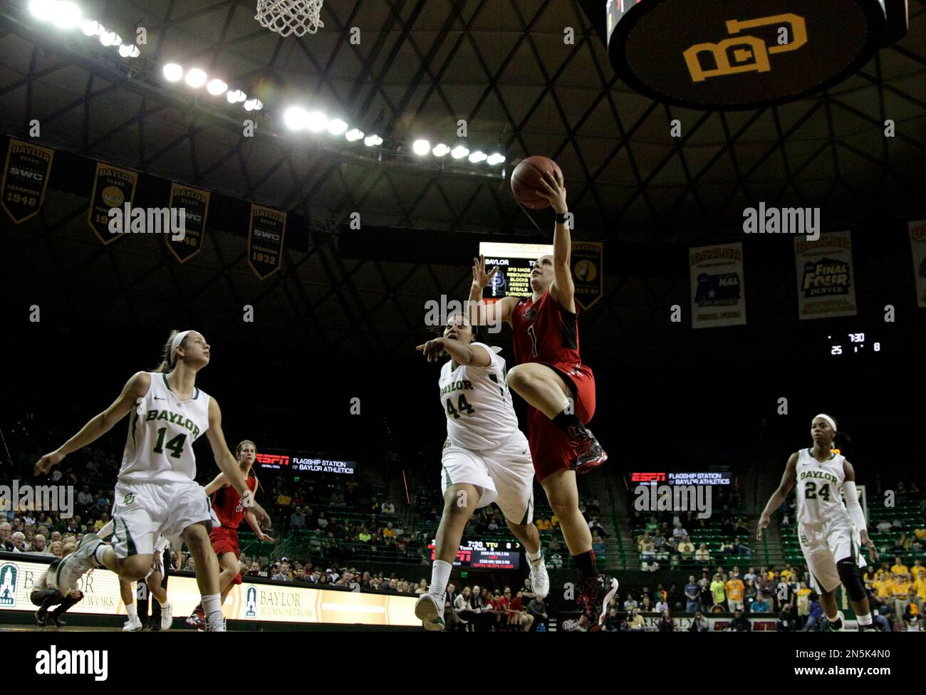Texas Tech guard Marina Lizarazu (1) leaps to the basket for a shot ...