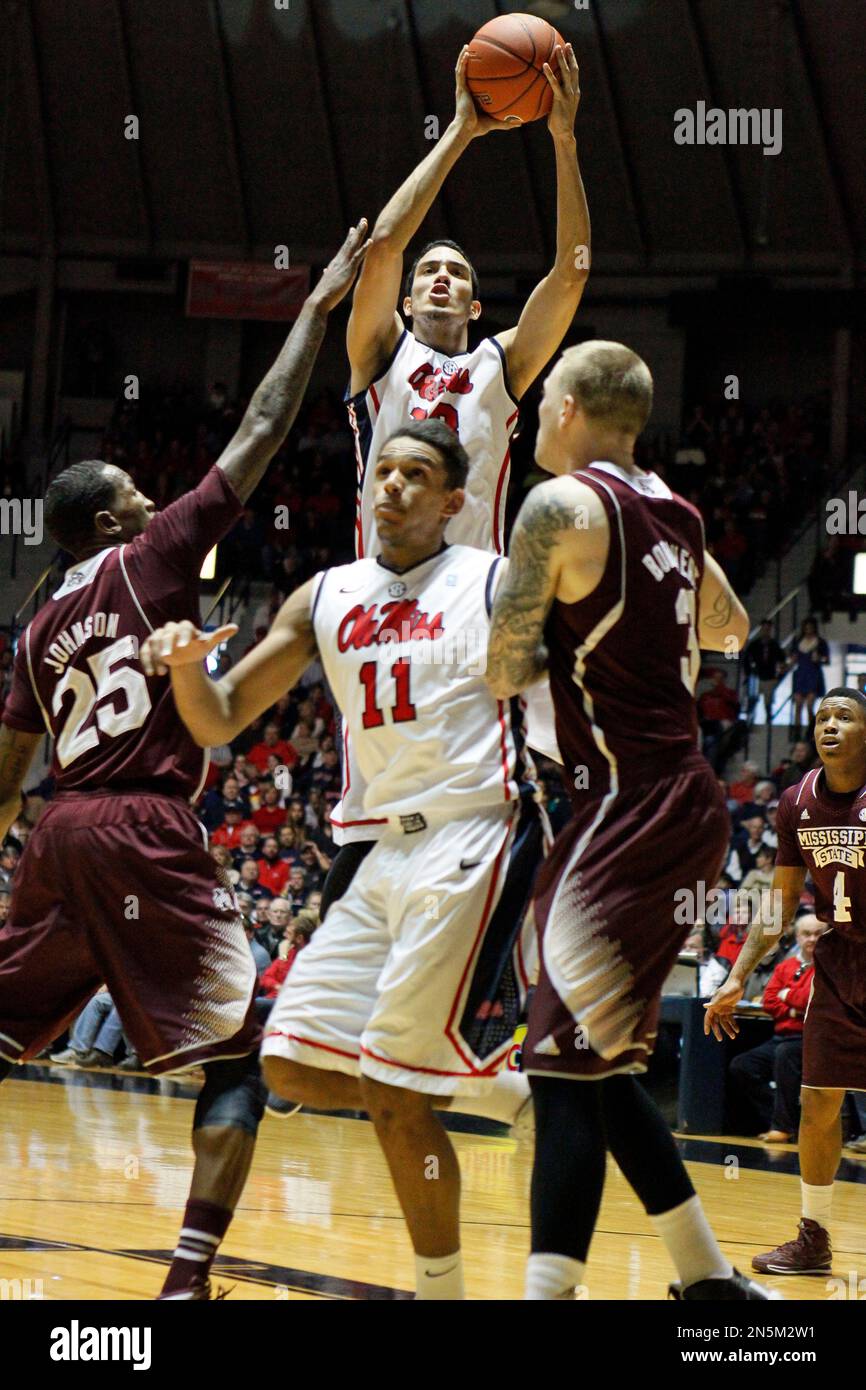 Mississippi forward Anthony Perez (13) attempts a shot while teammate ...