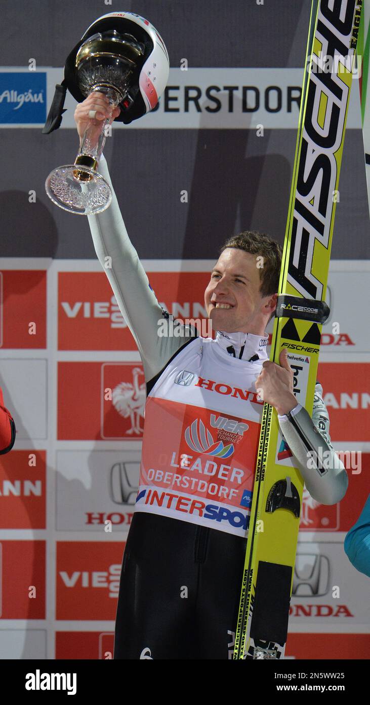 Switzerland's winner Simon Ammann celebrates during the victory ...