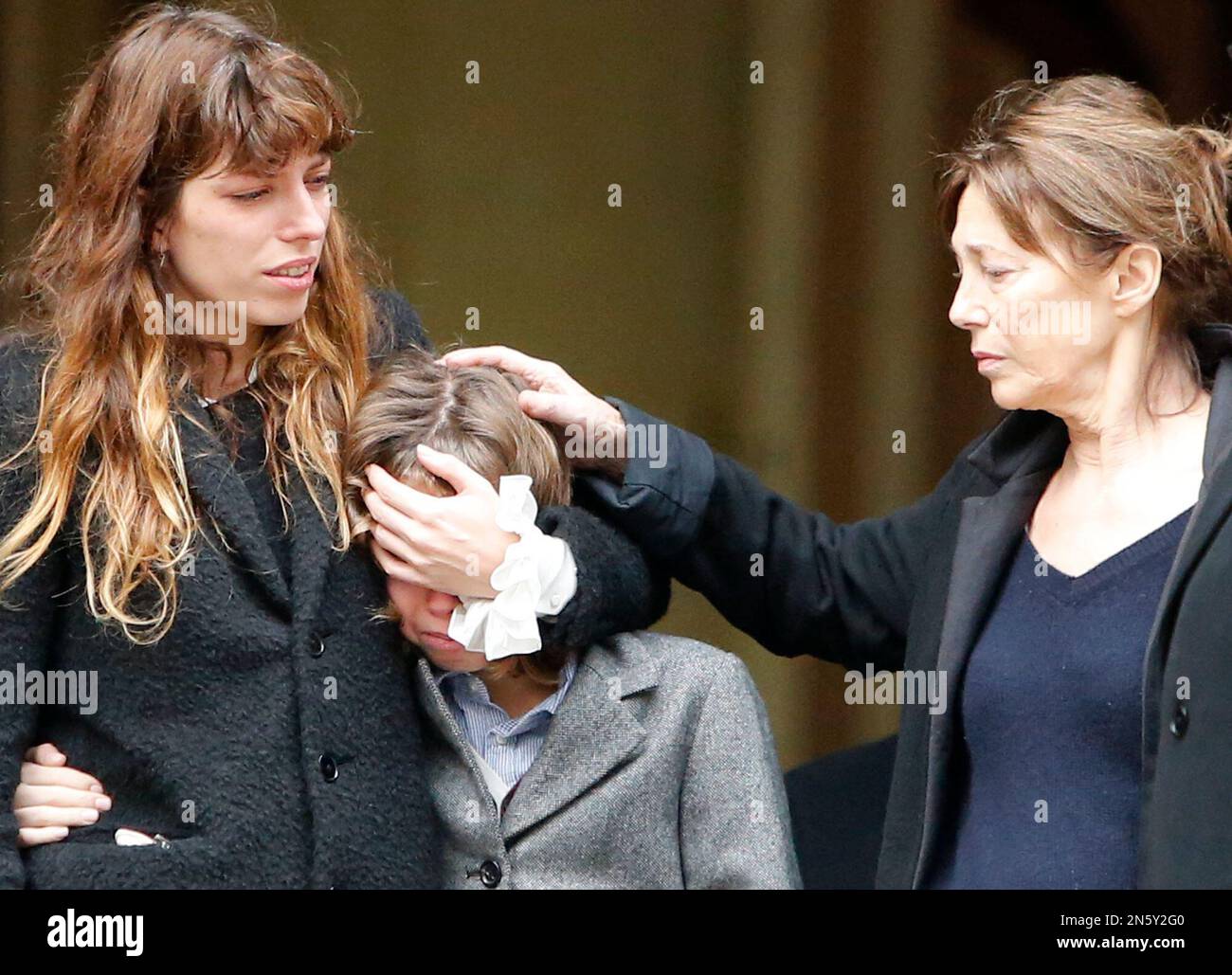 Kate Barry's mother, actress and singer Jane Birkin, right, comforts ...