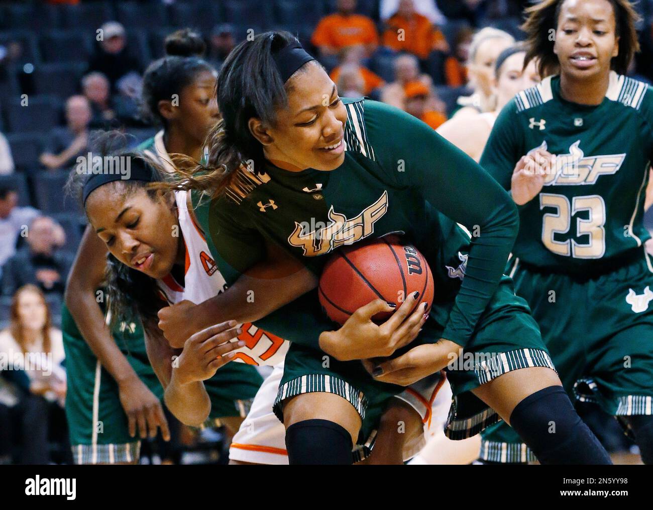 Oklahoma State center LaShawn Jones (55) and South Florida center Akila ...