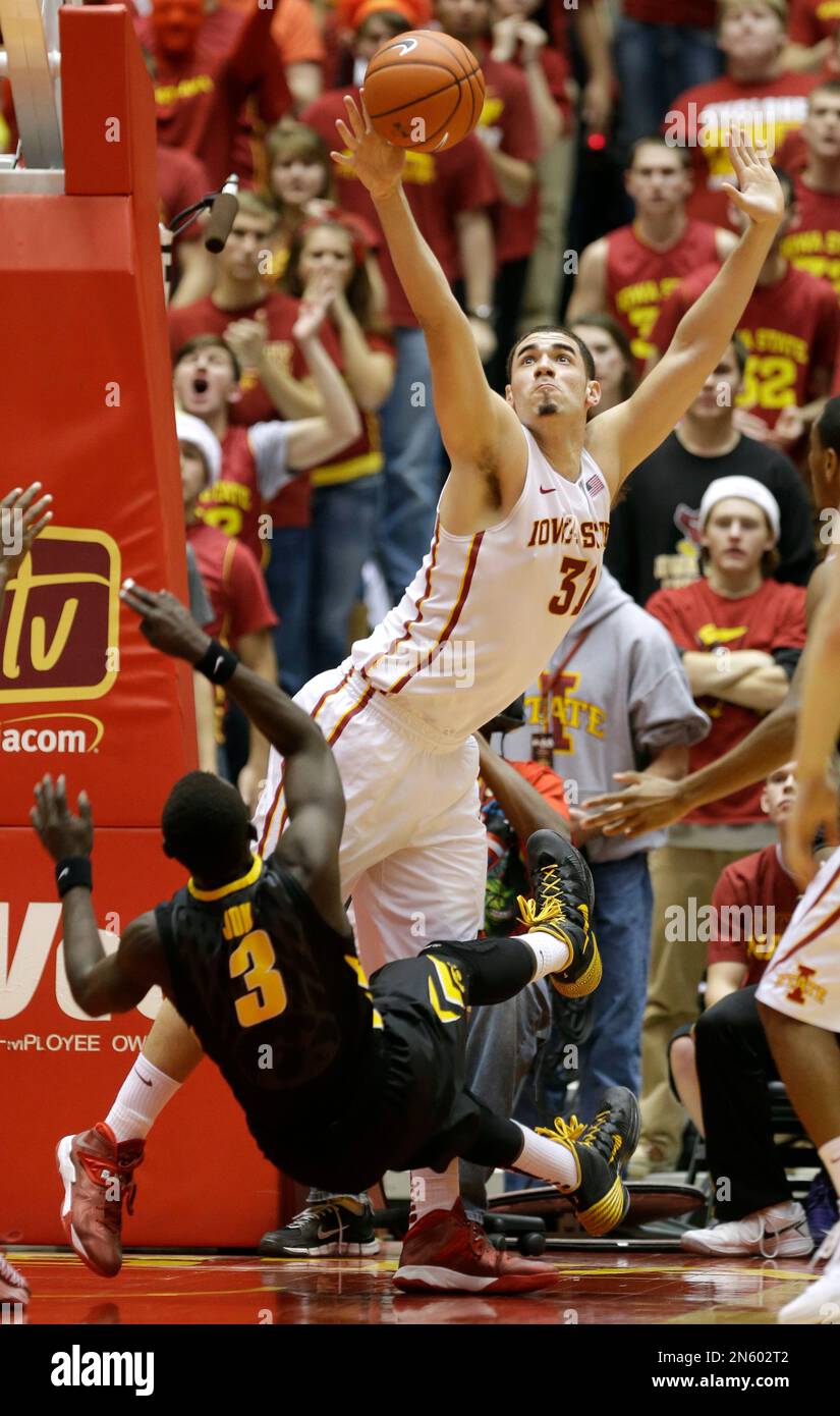 Iowa State forward Georges Niang blocks a shot by Iowa guard Peter Jok ...