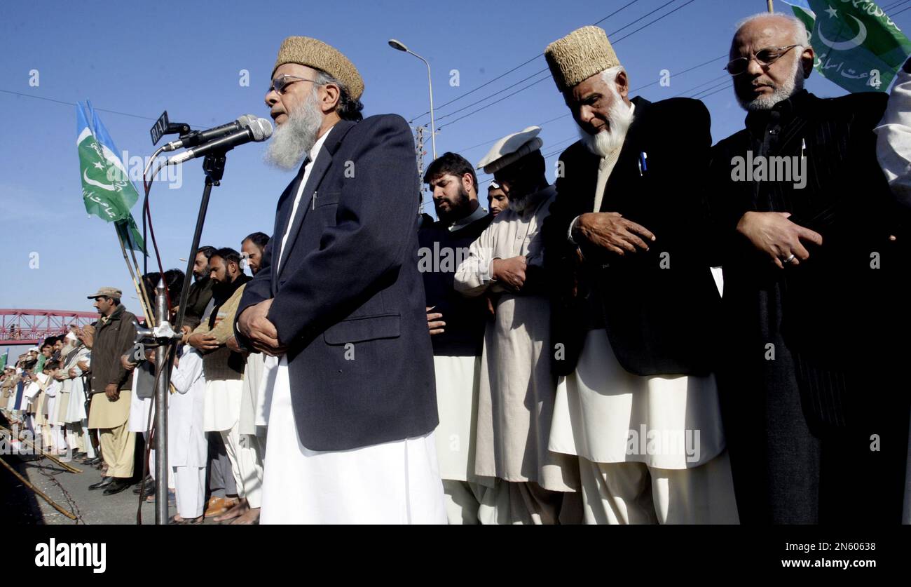 Munawar Hasan, center, leader of Pakistan's religious party Jammat-e ...