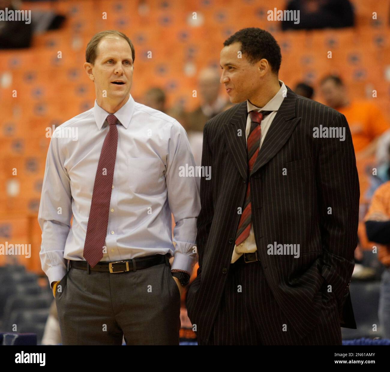 Syracuse assistant coach Mike Hopkins, left, and Binghamton assistant ...