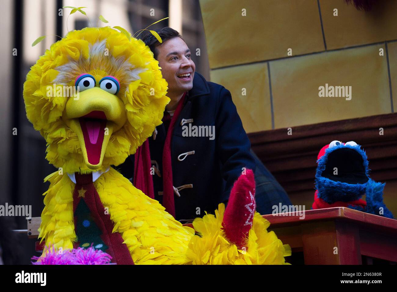 Television personality Jimmy Fallon rides on a float alongside Seasame ...