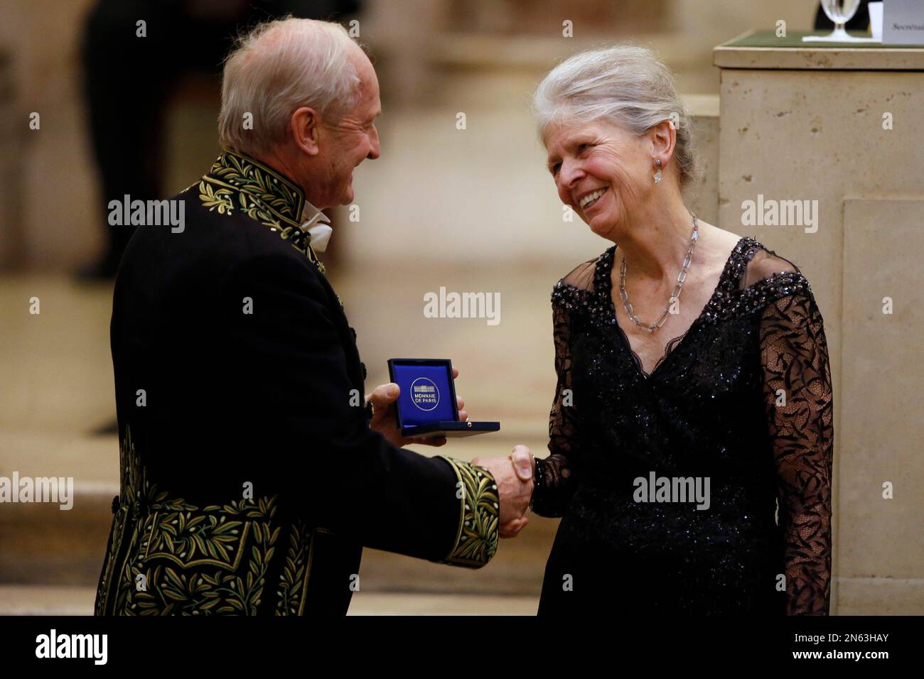U.S. molecular biologist Joan Argetsinger Steitz, right, receives the ...